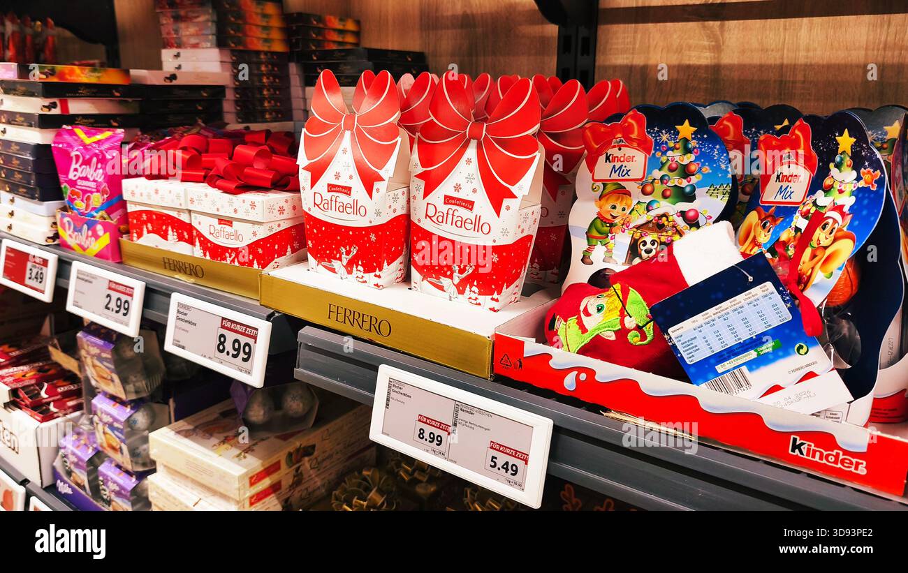 ISERLOHN, GERMANY — NOVEMBER 27 2025: Rafaello and Kinder chocolate ...
