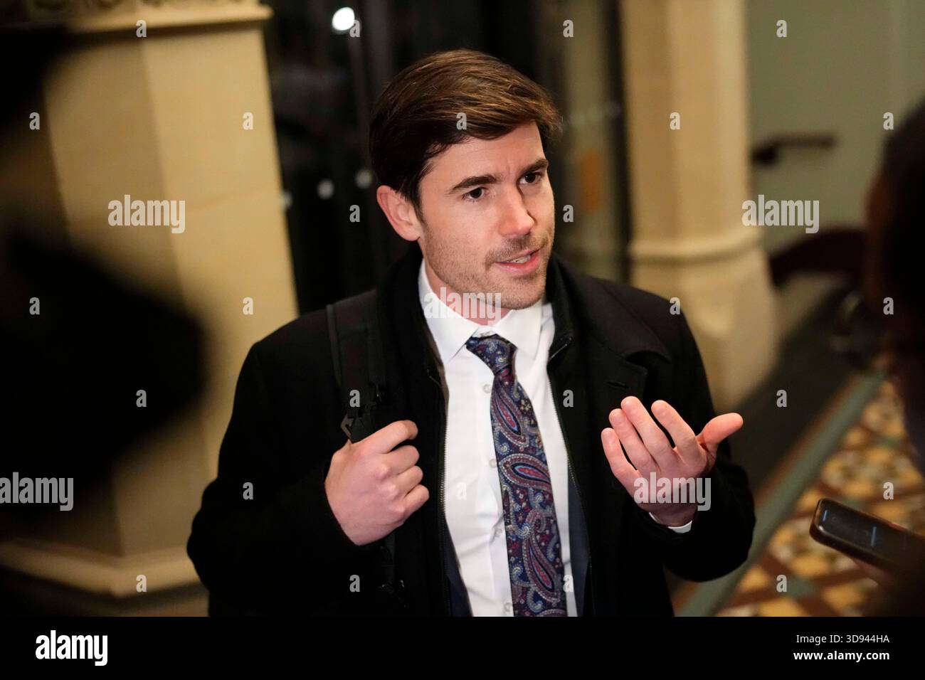 Liberal MP Patrick Weiler speaks as he makes his way to a meeting of the Liberal caucus on ...