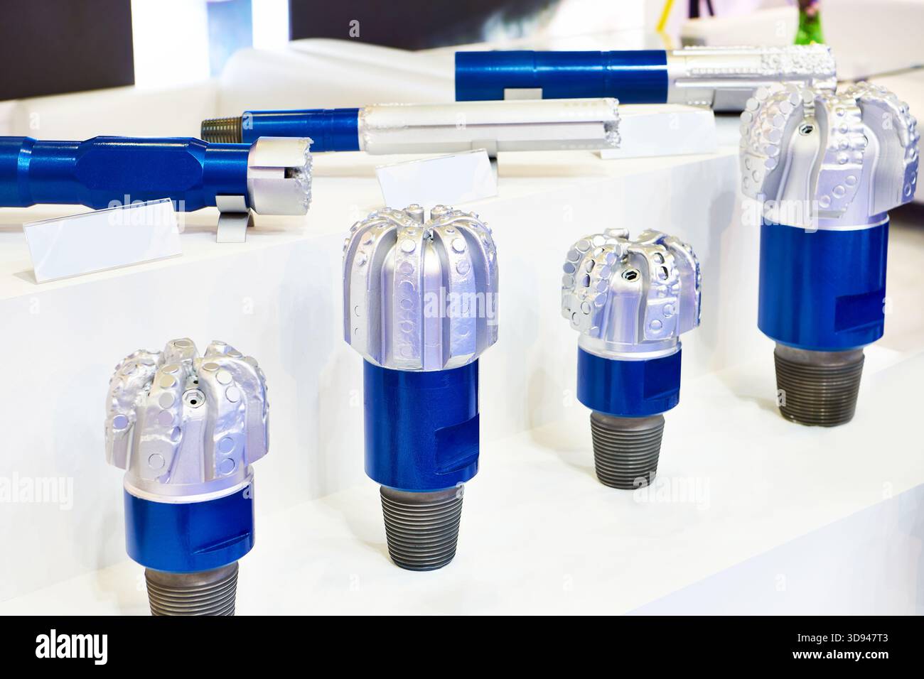 Drill bits for oil wells on exhibition Stock Photo - Alamy