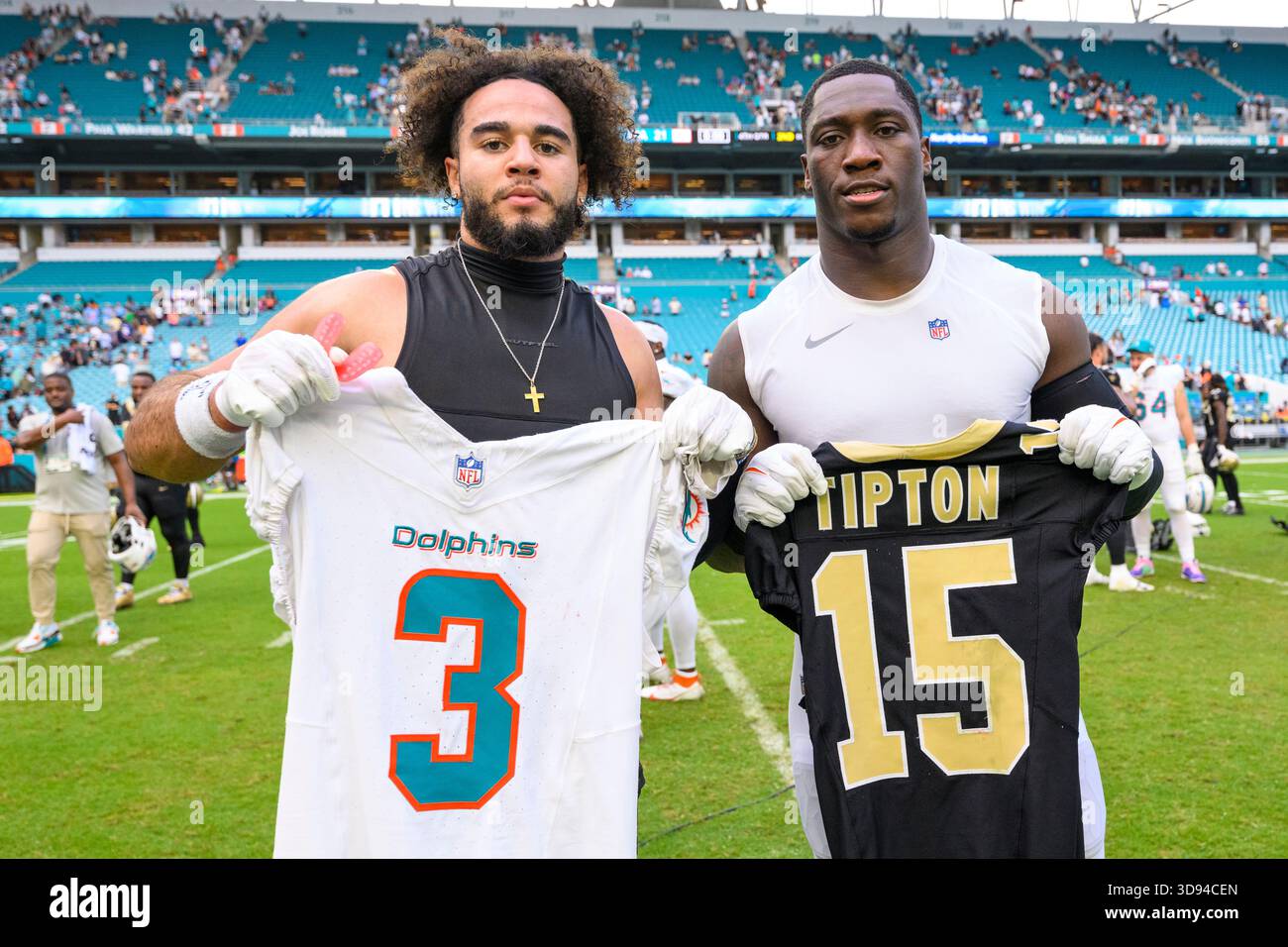 New Orleans Saints wide receiver Mason Tipton (15) and Miami Dolphins ...