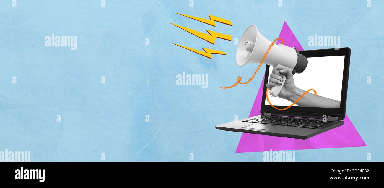 Hand with megaphone popping out of laptop screen on blue background ...
