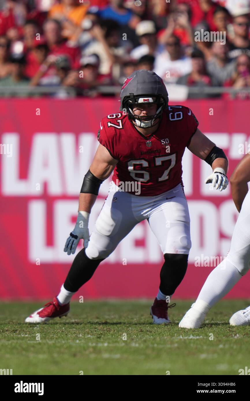 Tampa Bay Buccaneers offensive tackle Luke Goedeke (67) run blocks ...