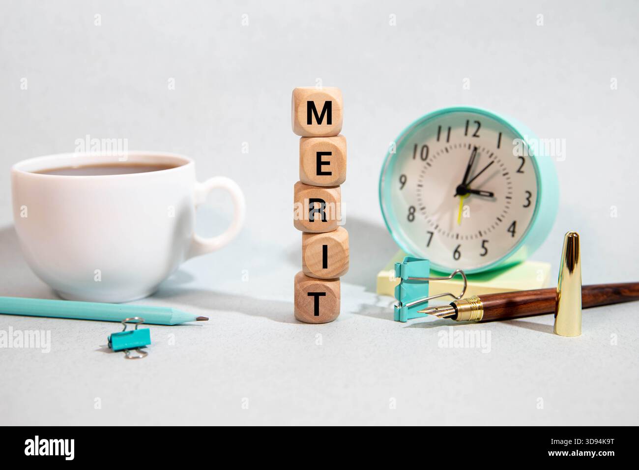 Merit symbol. Concept word Merit on beautiful wooden blocks. Beautiful ...