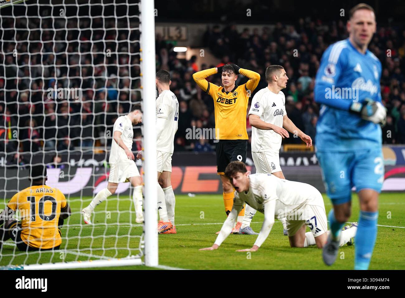 Wolverhampton Wanderers' Jorgen Strand Larsen (centre) rues a missed ...