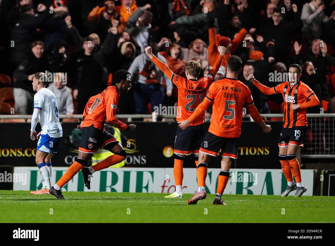 Dundee United's Amar Fatah (left) celebrates scoring their side's ...