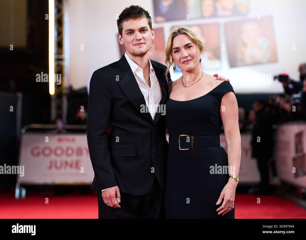 Writer Joe Anders, left, and Kate Winslet pose for photographers upon ...