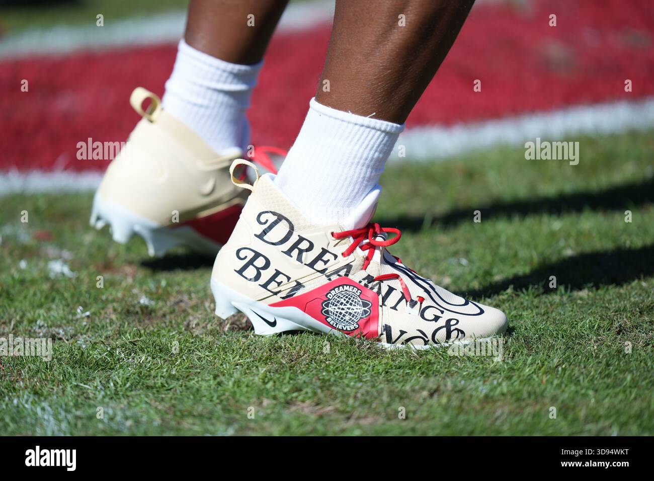 Tampa Bay Buccaneers defensive tackle C.J. Brewer (52) wears his shoes ...