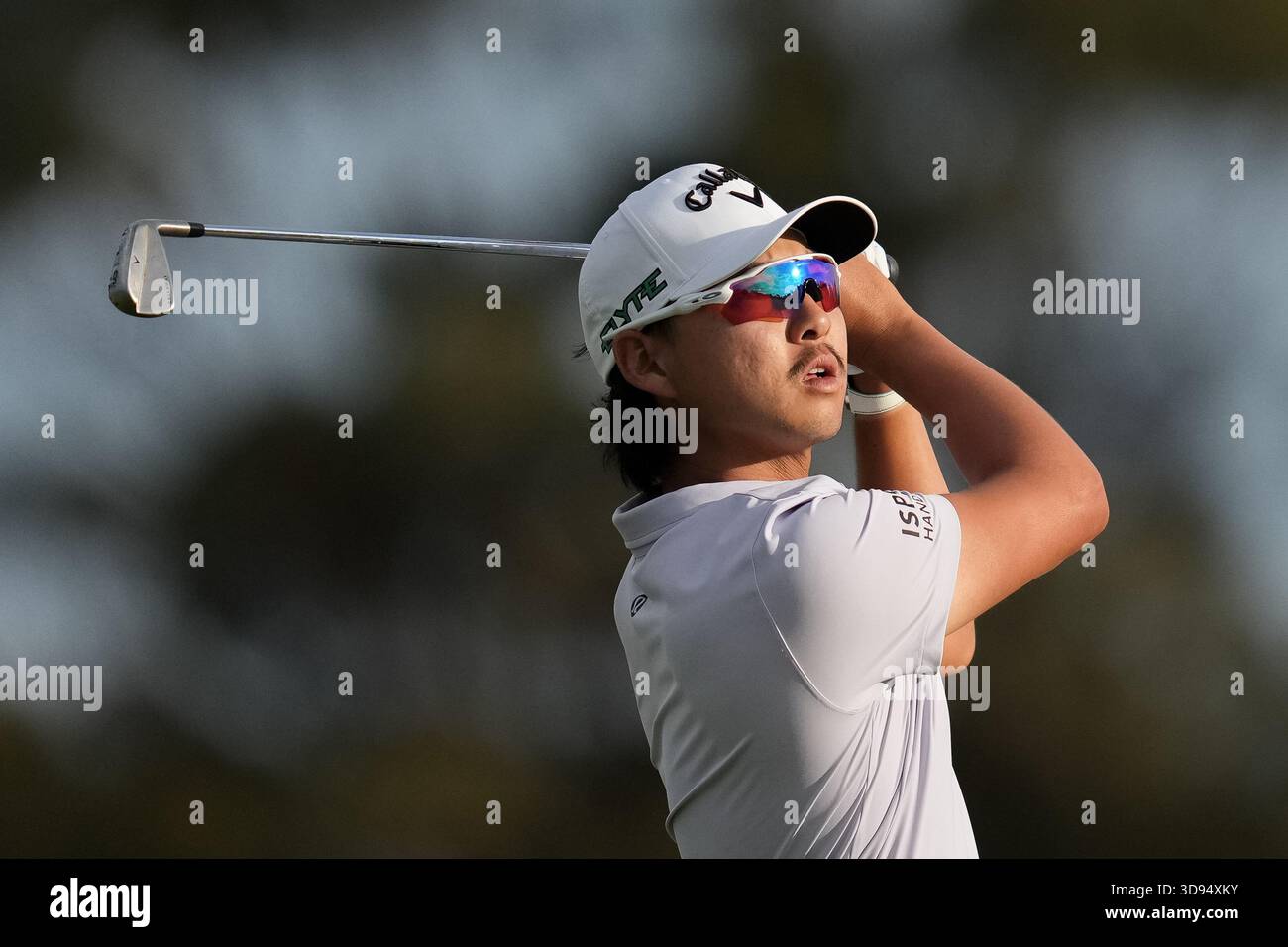 Min Woo Lee, of Australia, plays an approach shot on the 11th hole ...