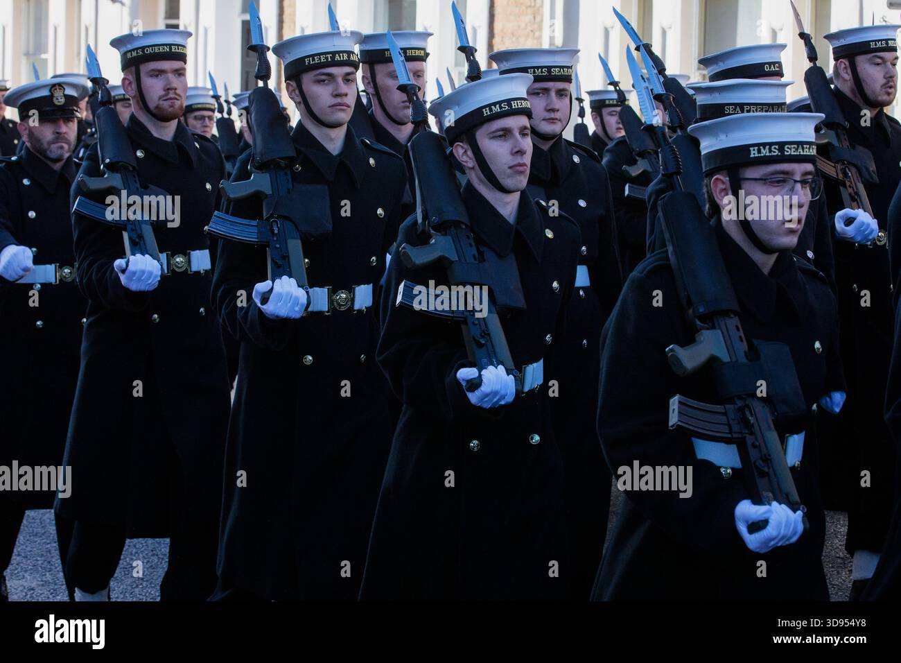 Windsor, UK. 3rd December, 2025. Royal Navy personnel march before a ...