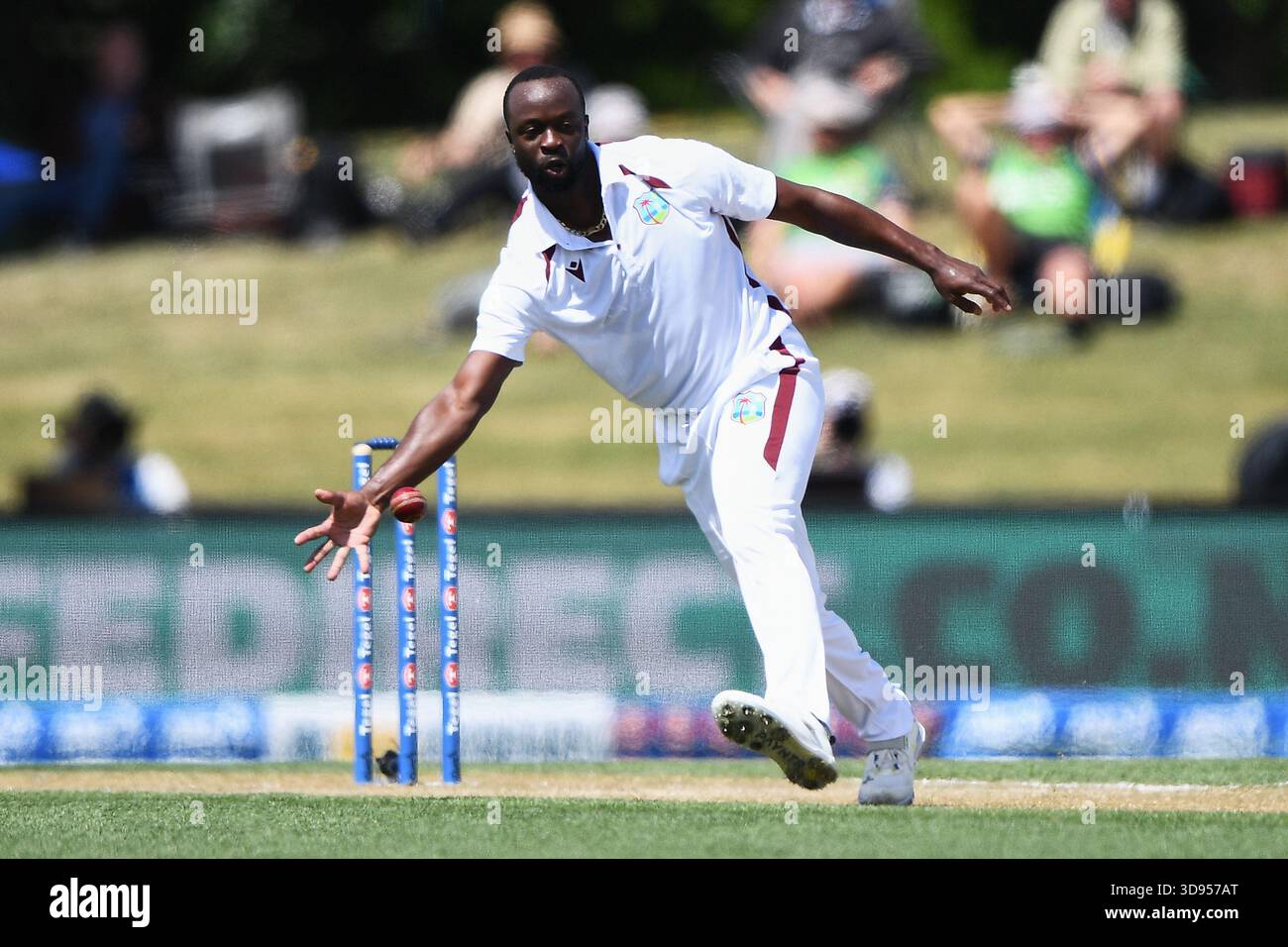 West Indies' Kemar Roach fields against New Zealand during their ...