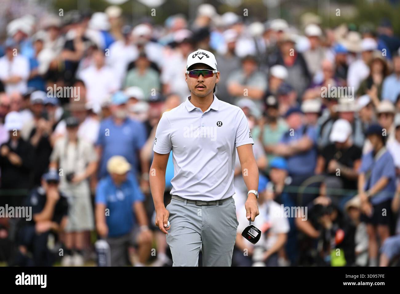 Min Woo Lee of Australia reacts in round one of the Australian Open ...