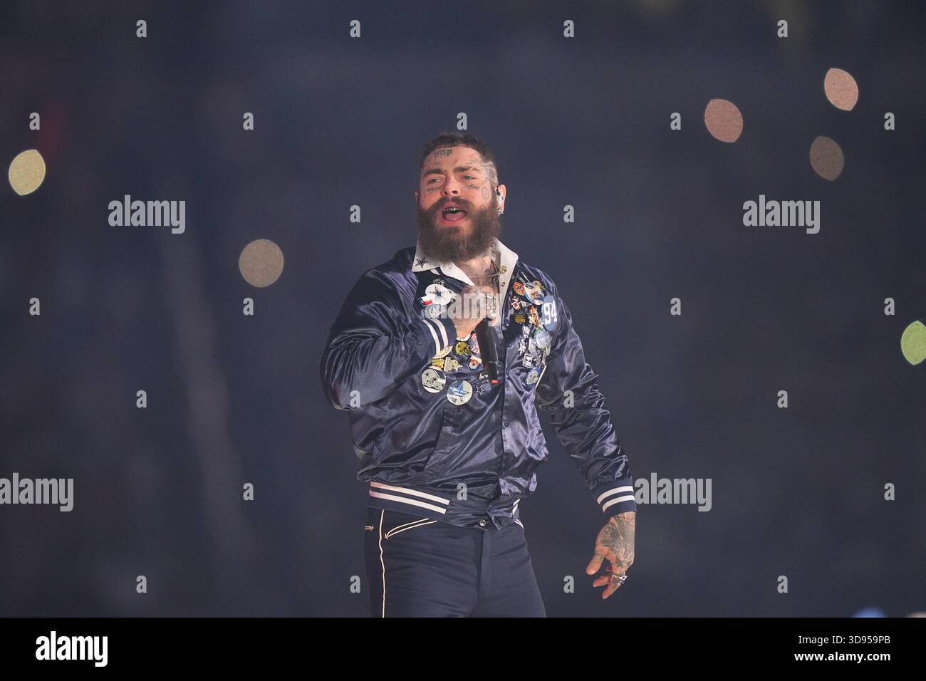 Post Malone performs during halftime of an NFL football game between ...