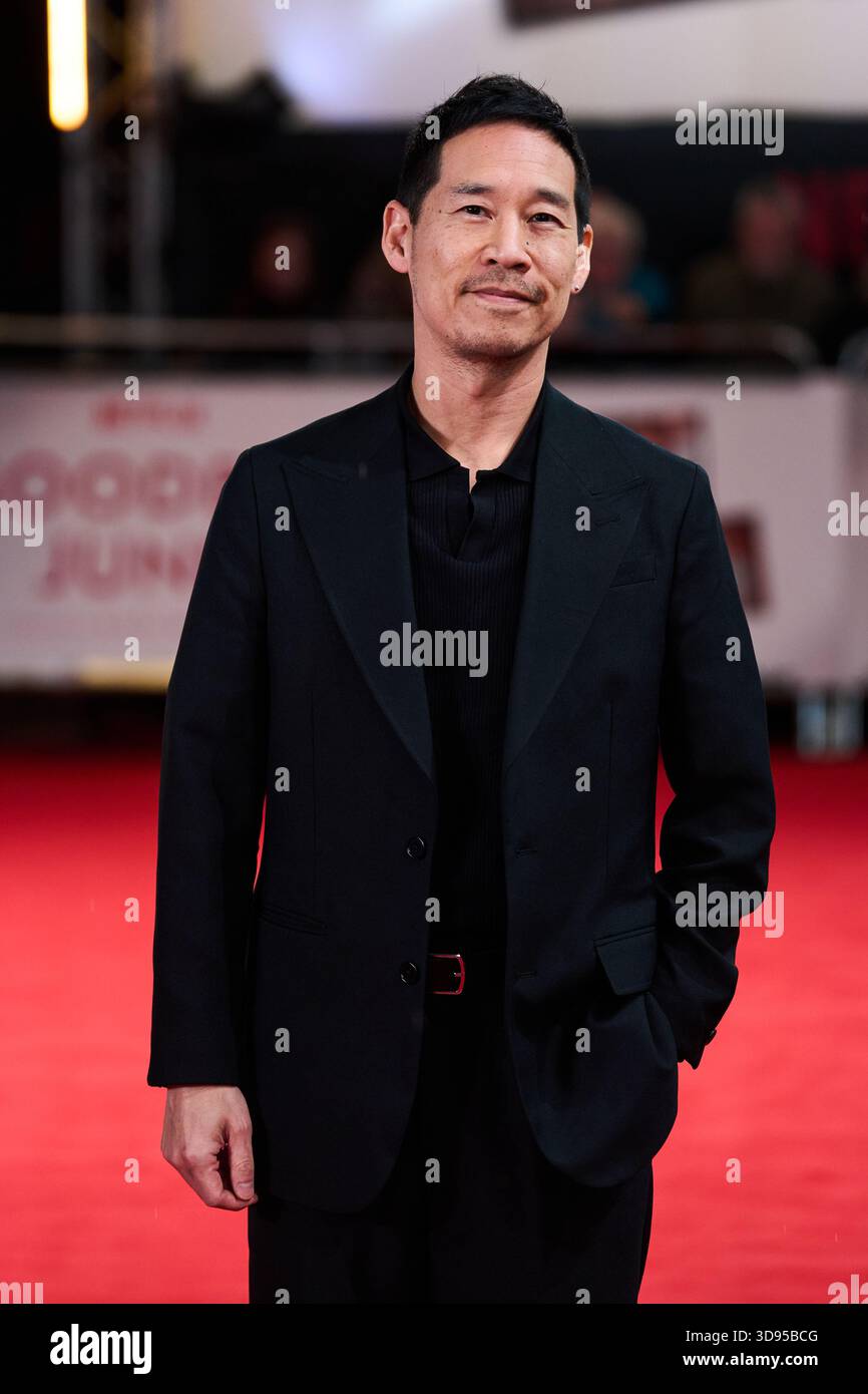 Dan Li poses for photographers upon arrival at the World premiere of ...