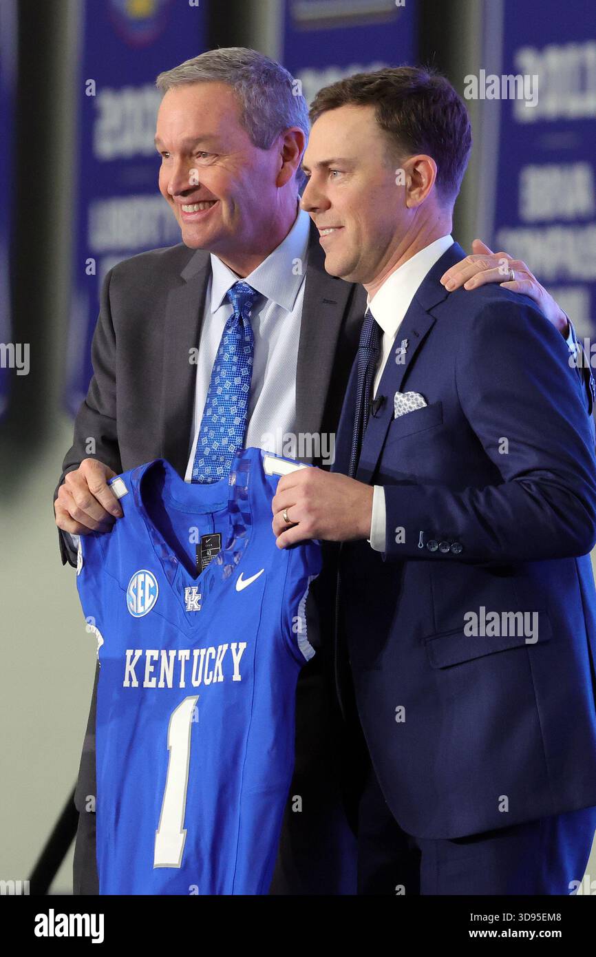 Kentucky athletic director Mitch Barnhart, left, and new head football ...