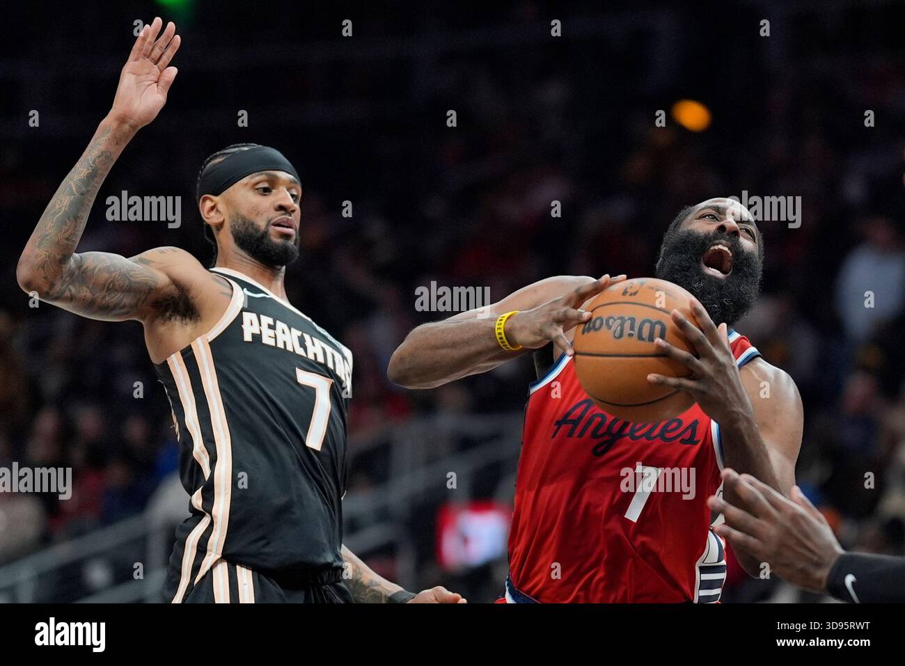 Los Angeles Clippers guard James Harden (1) drives against Atlanta ...