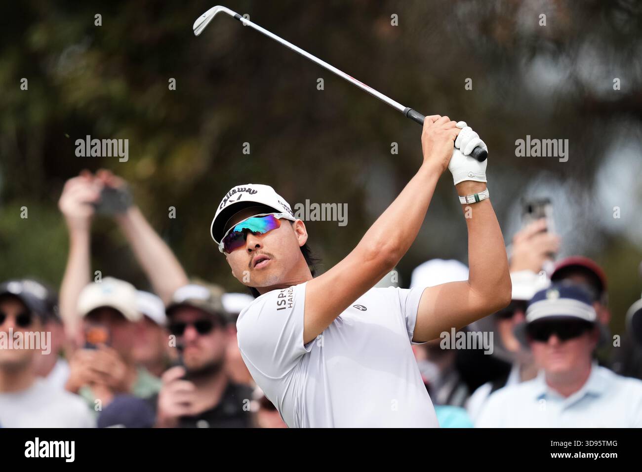 Min Woo Lee of Australia tees off on the fourth hole during the first ...
