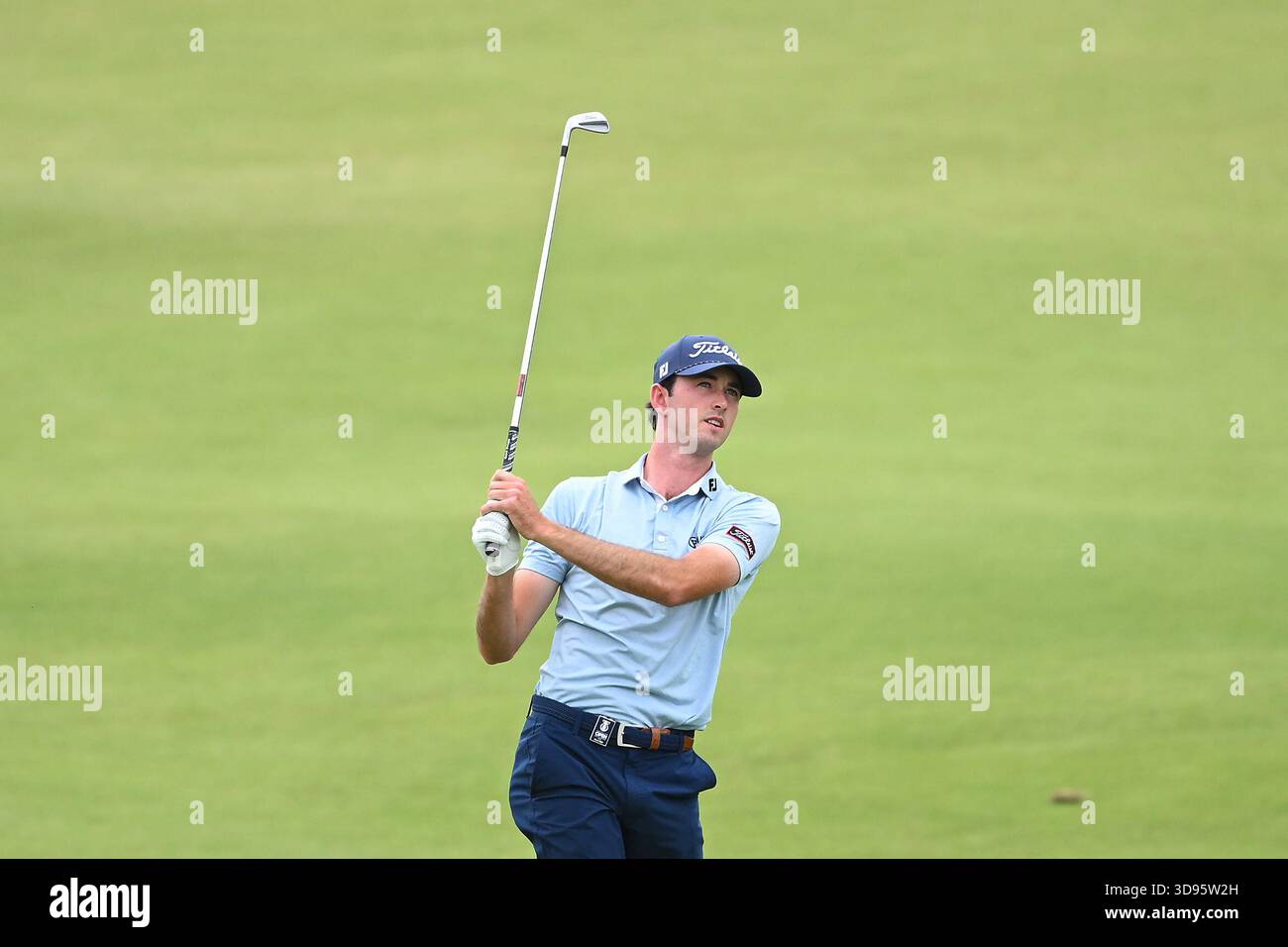 Elvis Smylie of Australia plays a shot in round one of the Australian ...