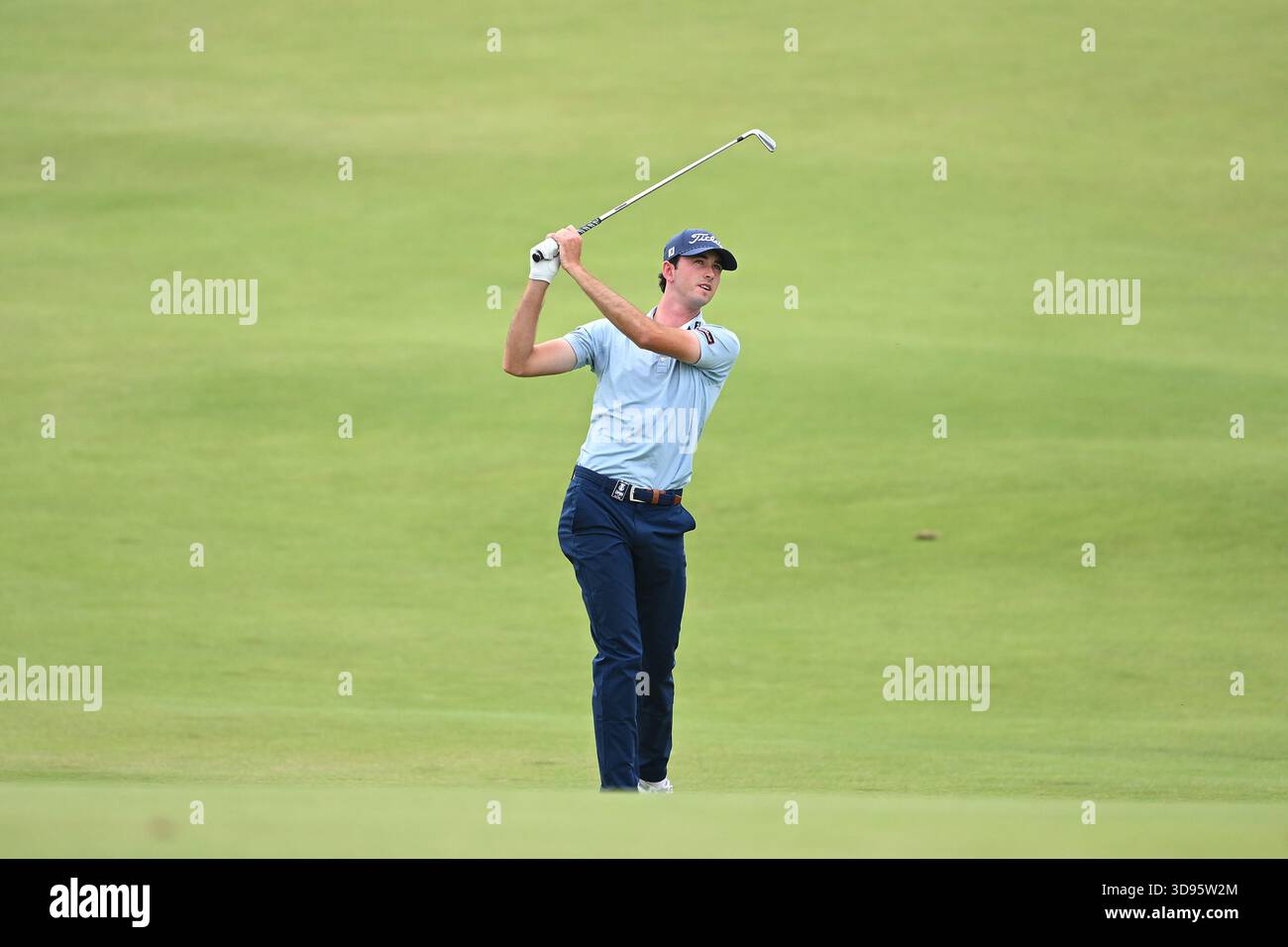 Elvis Smylie of Australia plays a shot in round one of the Australian ...