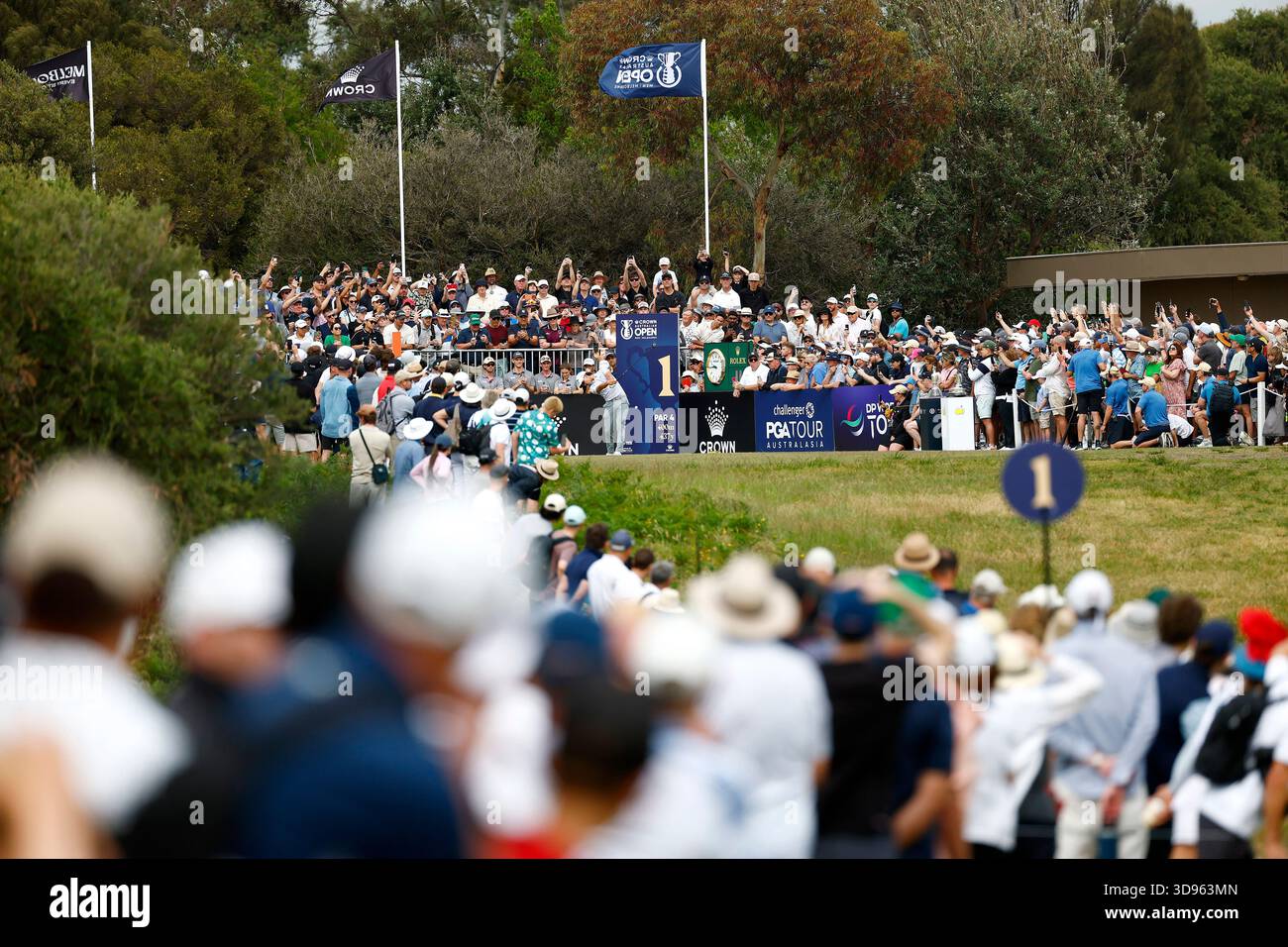 Min Woo Lee of Australia tees of on the 1st hole during the Australian ...