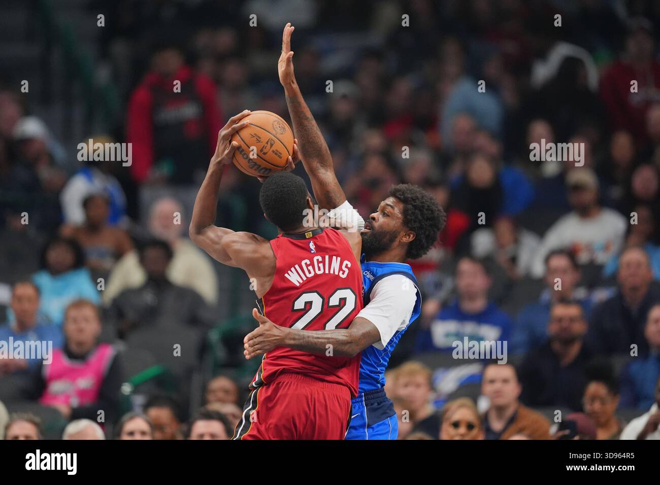 Miami Heat forward Andrew Wiggins (22) goes up for a basket against ...