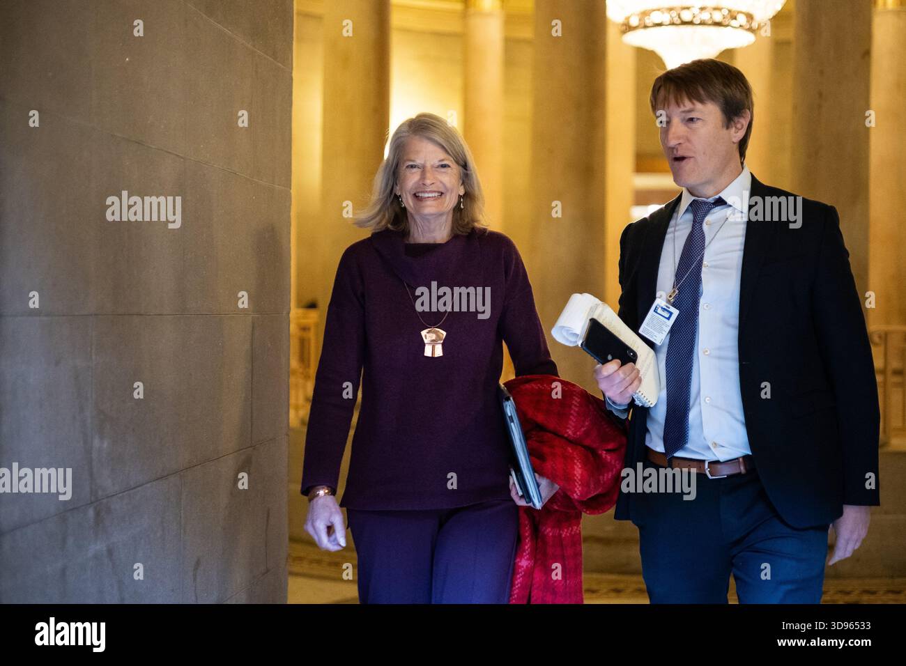 Sen. Lisa Murkowski (R-Alaska) walks to a meeting at the U.S. Capitol ...
