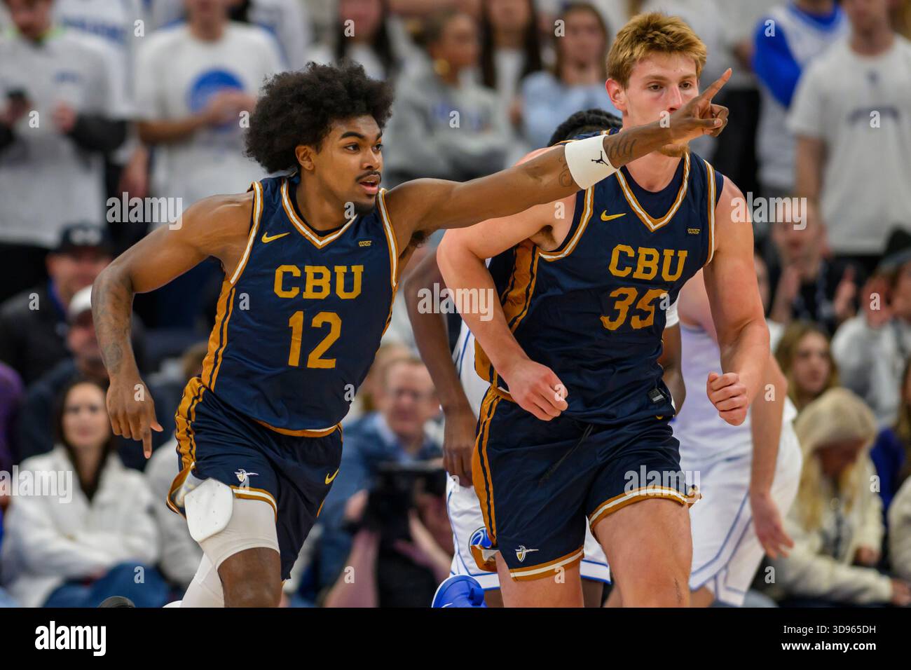 California Baptist guard Devon Malcolm (12) points to the sideline ...