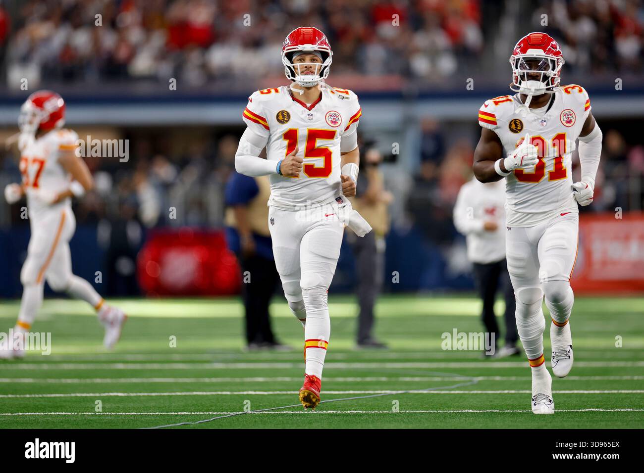 Kansas City Chiefs quarterback Patrick Mahomes (15) and linebacker ...