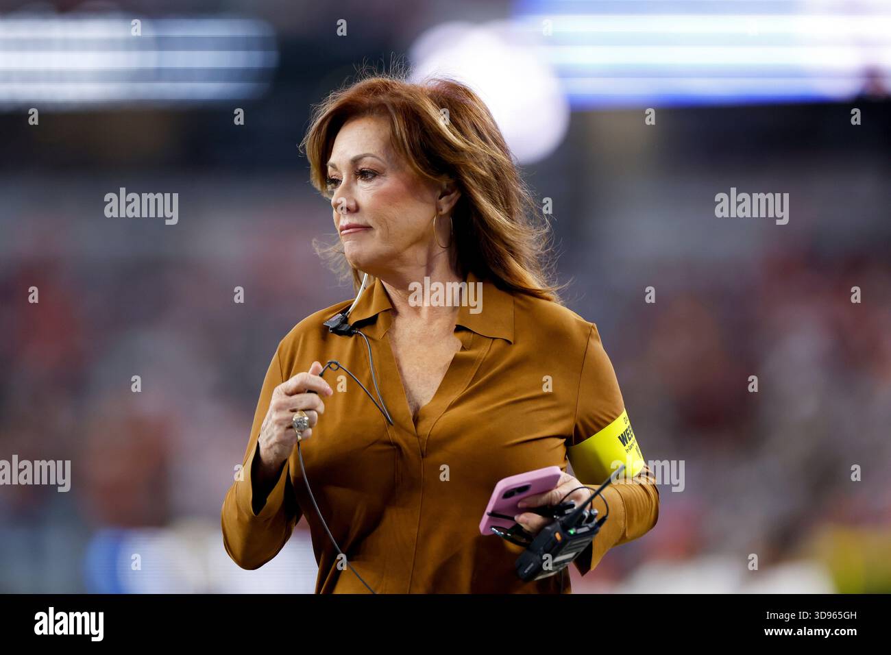Dallas Cowboys cheerleaders director Kelli Finglass walks off the field ...
