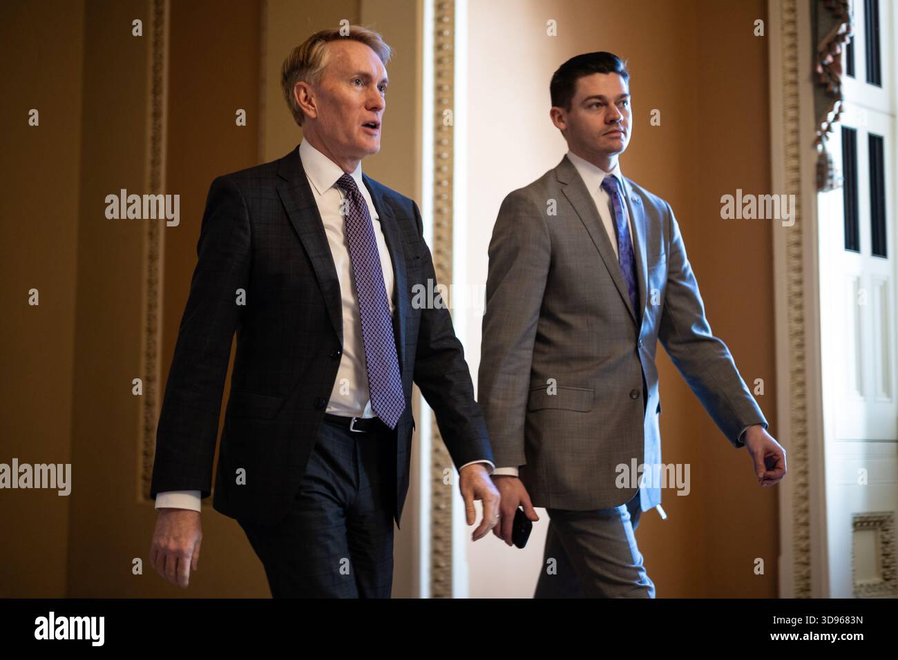 Sen. James Lankford (R-Okla.) walks to a Senate Republican Conference ...