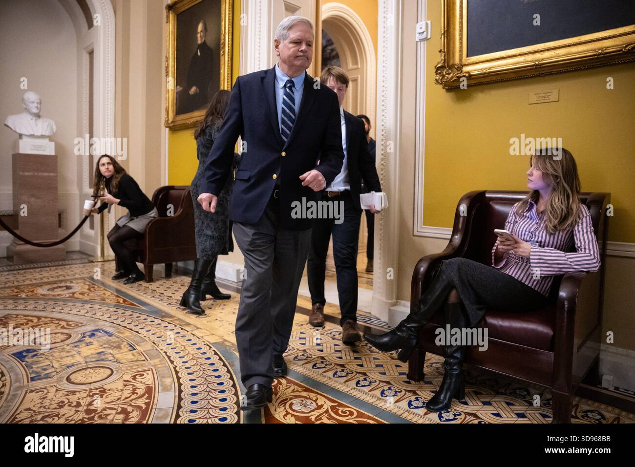 Sen. John Hoeven (R-N.D.) arrives for a Senate Republican Conference ...