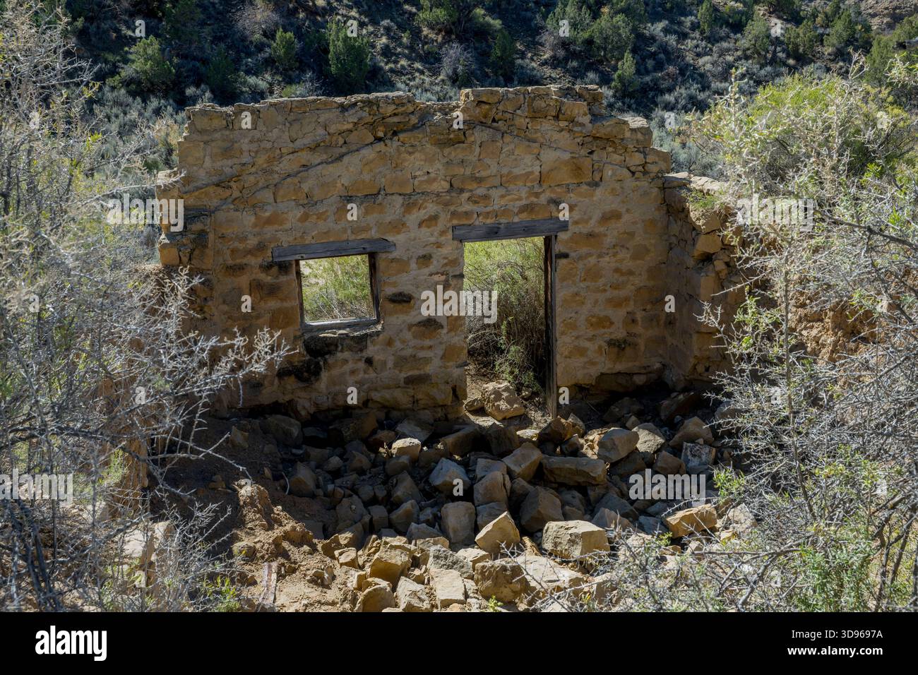 The remains of a small stone building in the former coal mining town ...