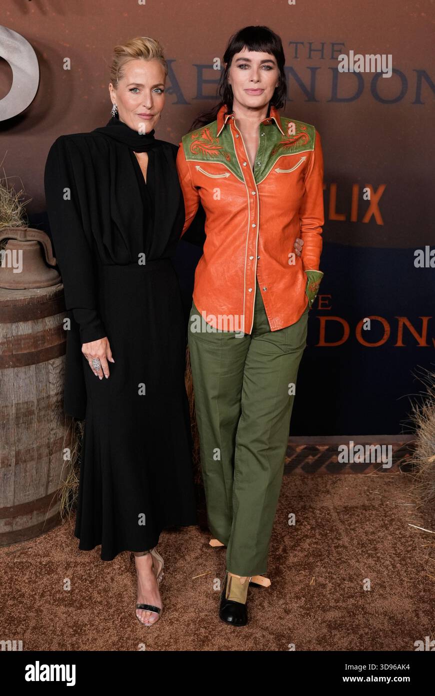 Gillian Anderson, left, and Lena Headey, cast members in "The Abandons," pose together at the ...