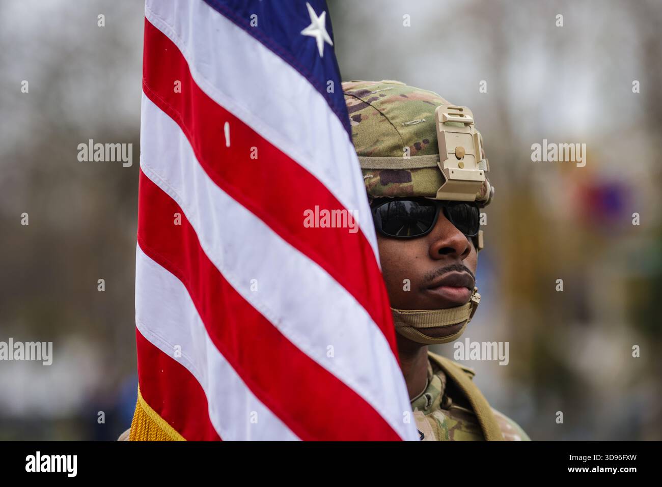 Bucharest, Romania - December 1, 2025: US soldier preparing to attend ...