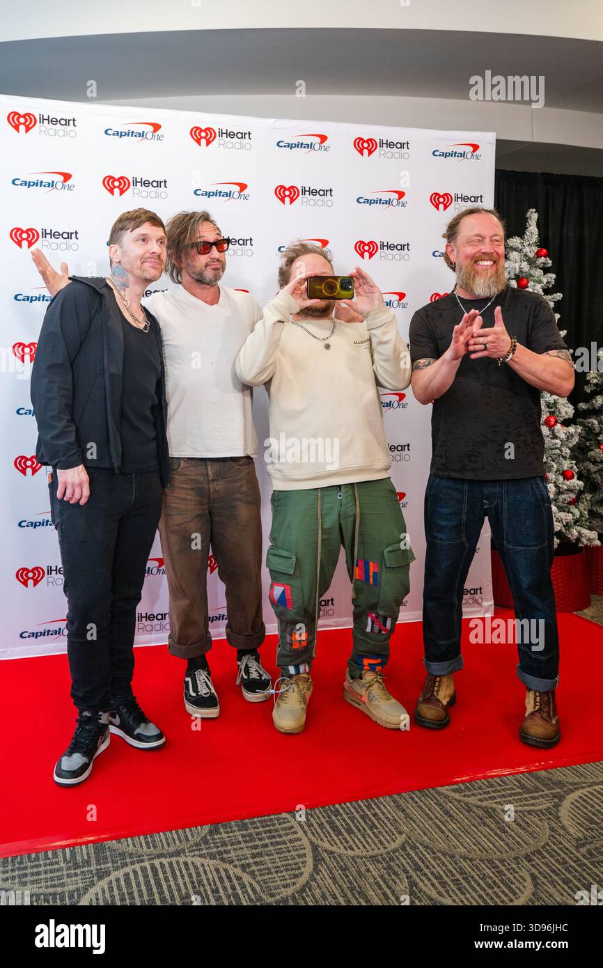Brent Smith, Eric Bass, Zach Myers and Barry Kerch of Shinedown attend ...