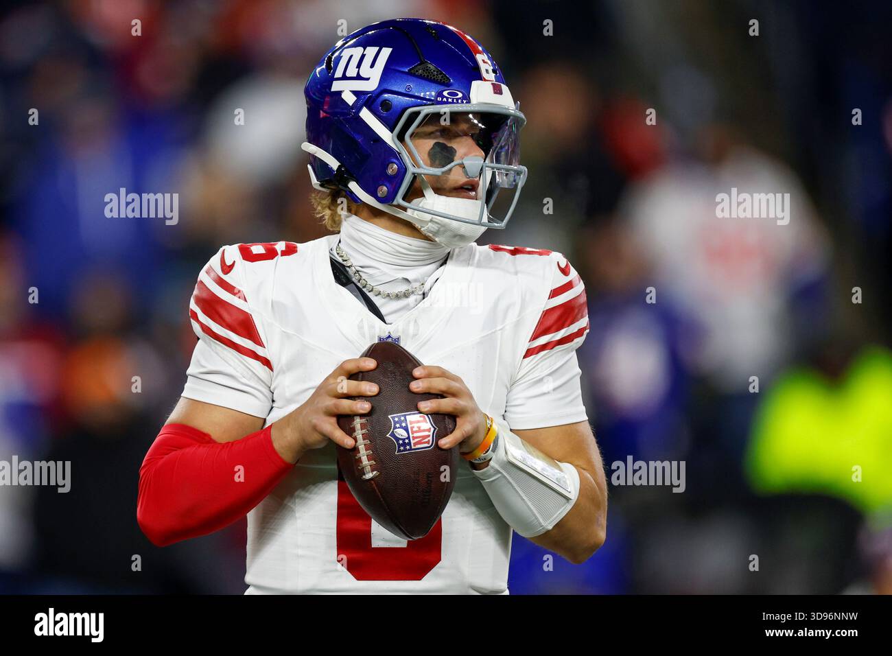 New York Giants quarterback Jaxson Dart (6) drops back to make a pass ...