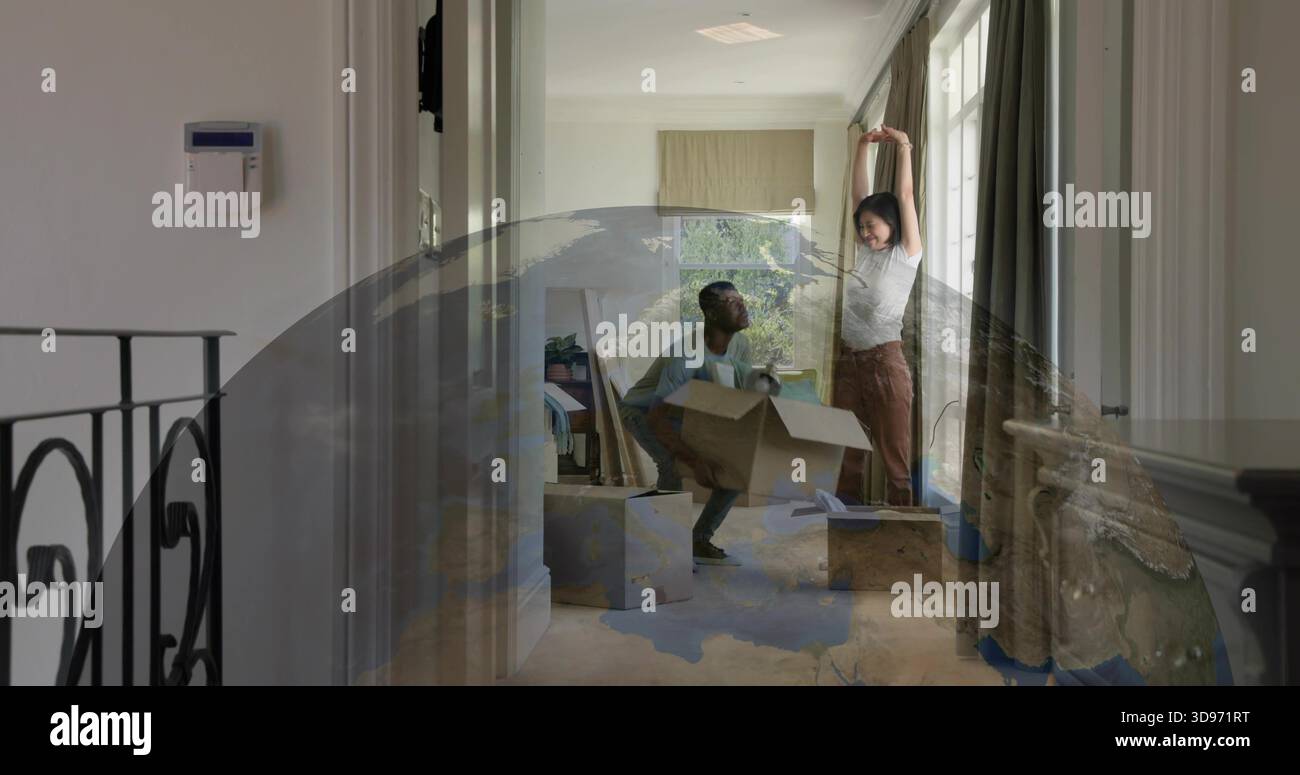 Lifting box man crouching while woman stretching in home hallway, boxes ...