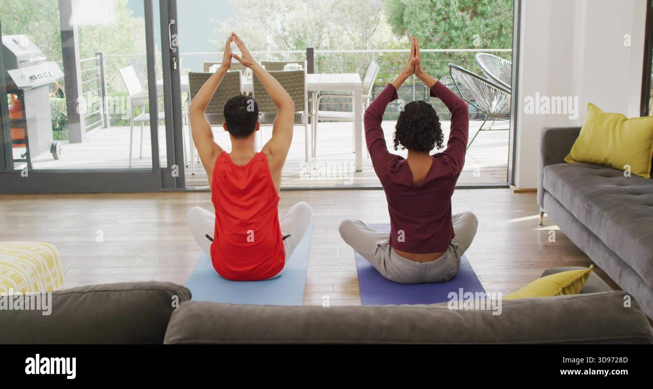 Workout partners stretching overhead in hi-res stock photography and ...