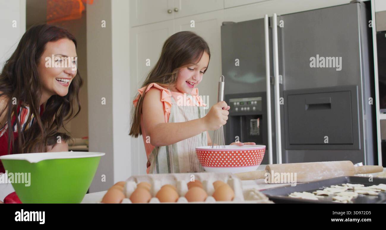 Whisking girl in apron hi-res stock photography and images - Alamy