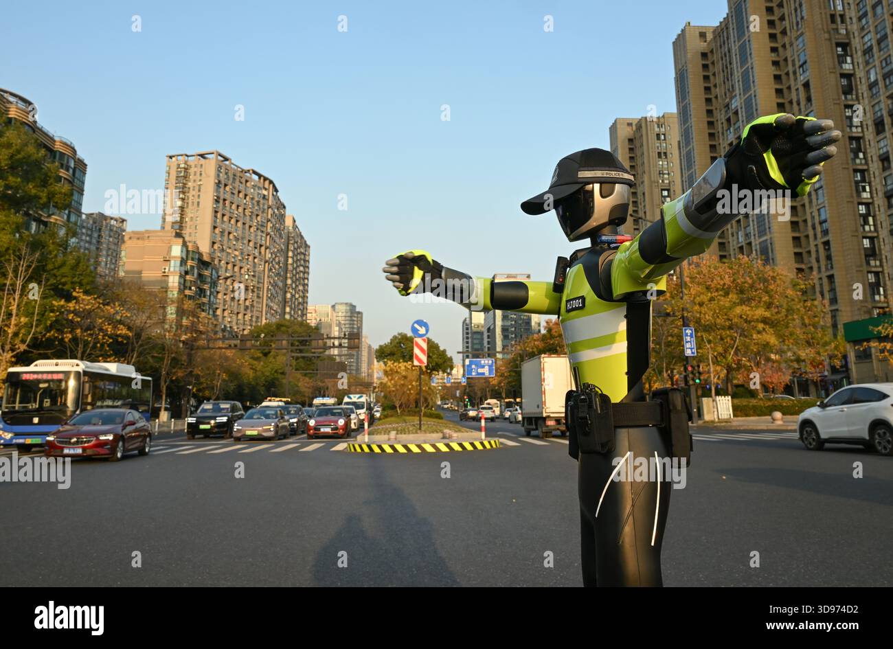 Hangzhou,China.3rd December 2025. A robot traffic officer using ...