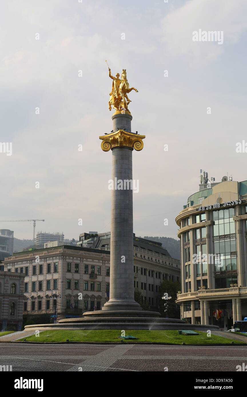 Tbilisi, Georgia-November 13,2025:Freedom Square with cars ,Bus, Hotel ...