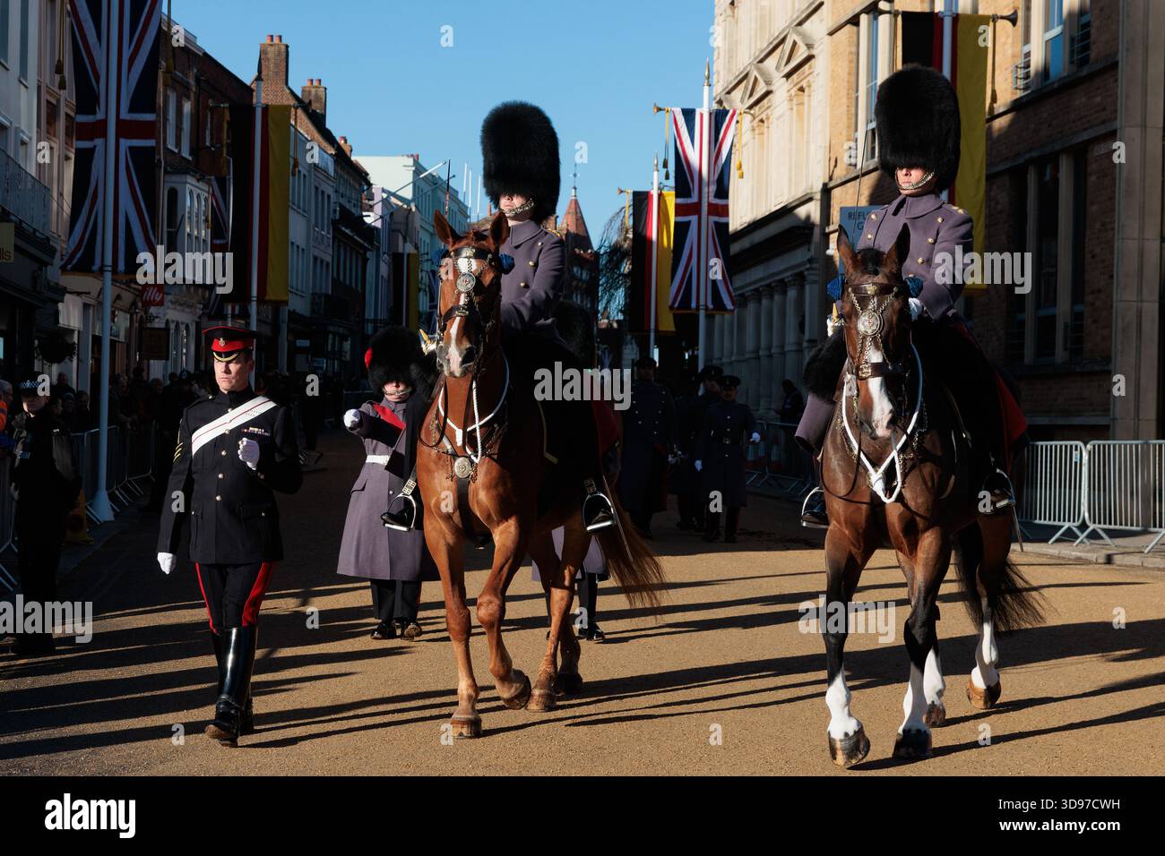 Windsor, UK. 3rd December, 2025. Military personnel pass along Windsor ...