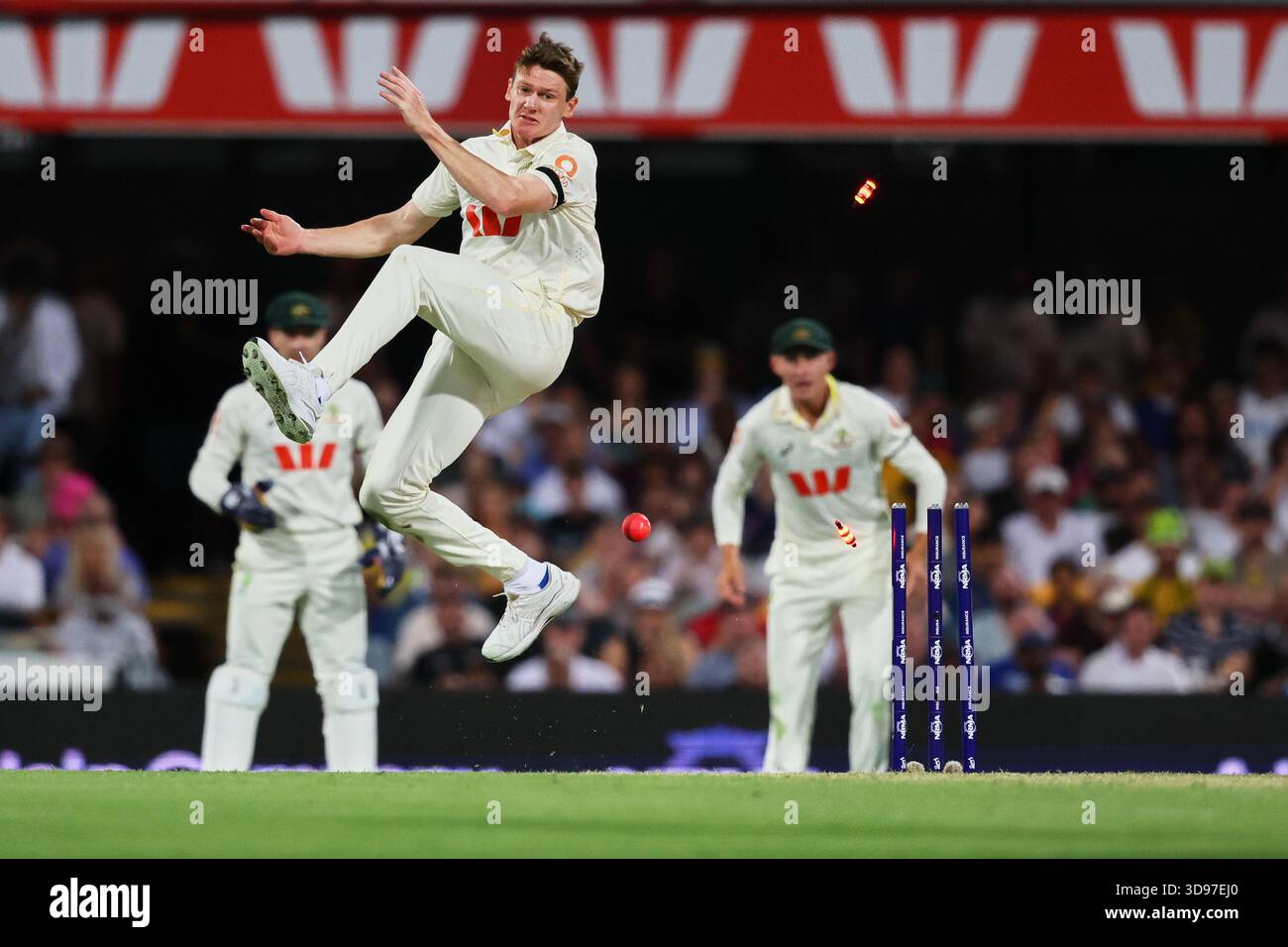 Australia's Brendan Doggett celebrates the run out of England's captain ...