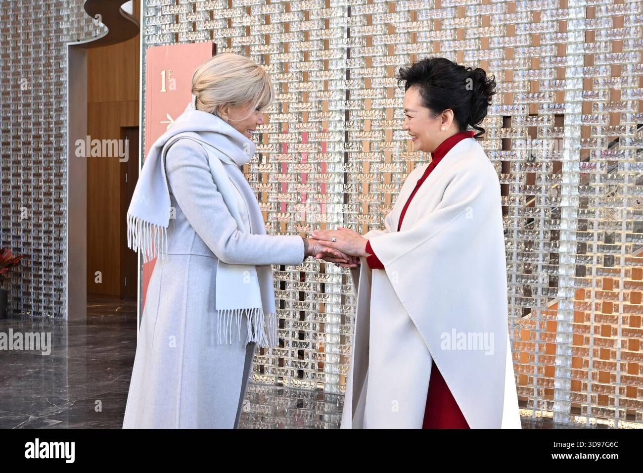 Beijing, China. 4th Dec, 2025. Peng Liyuan, wife of Chinese President ...