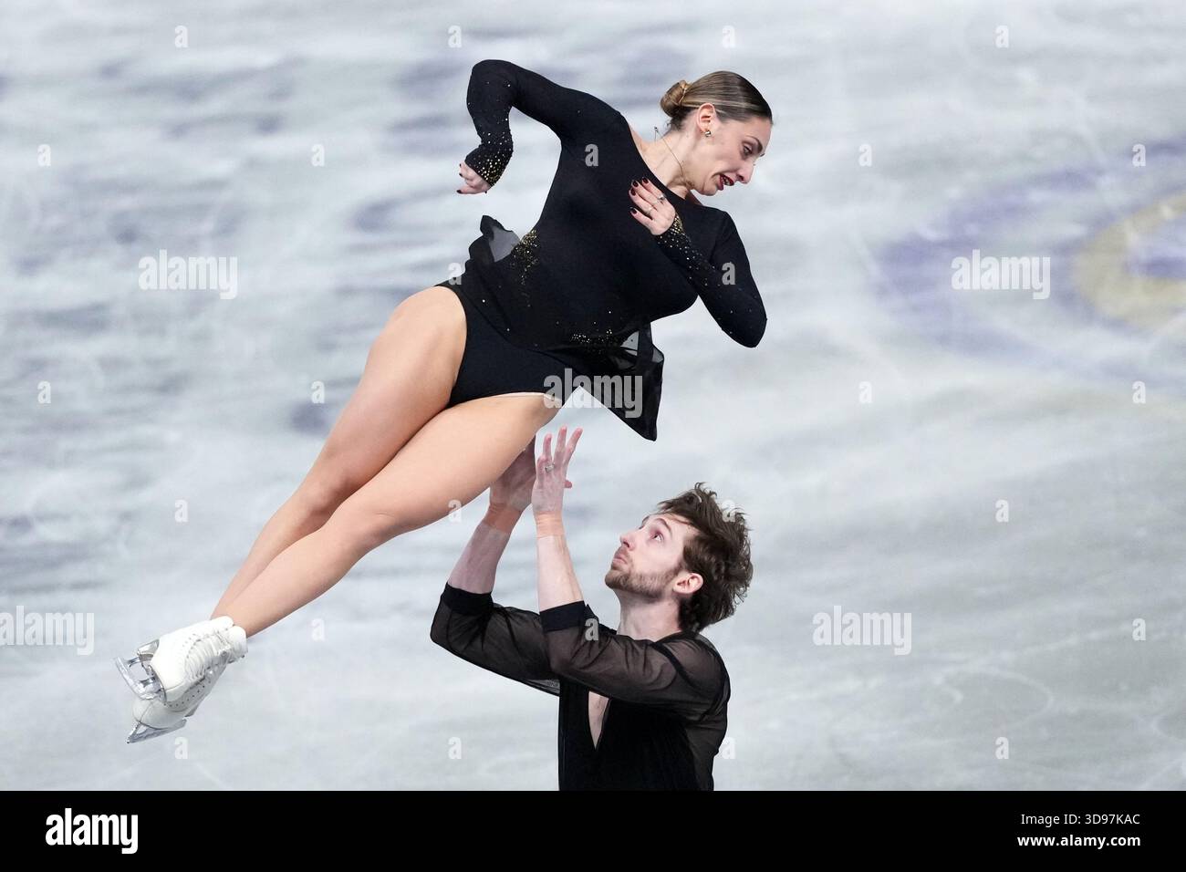 Sara Conti and Niccolo Macii, of Italy, compete in the pairs' short ...