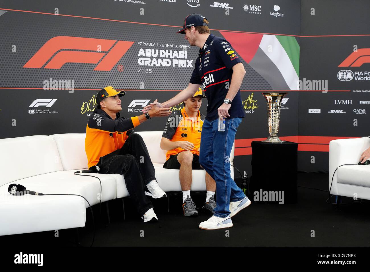 Red Bull Racing's Max Verstappen (right), McLaren drivers Lando Norris ...
