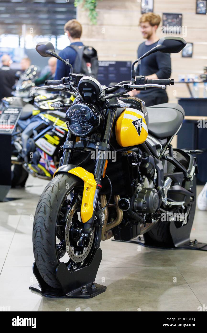 Visitors explore Triumph Motorcycles models, including modern classics ...