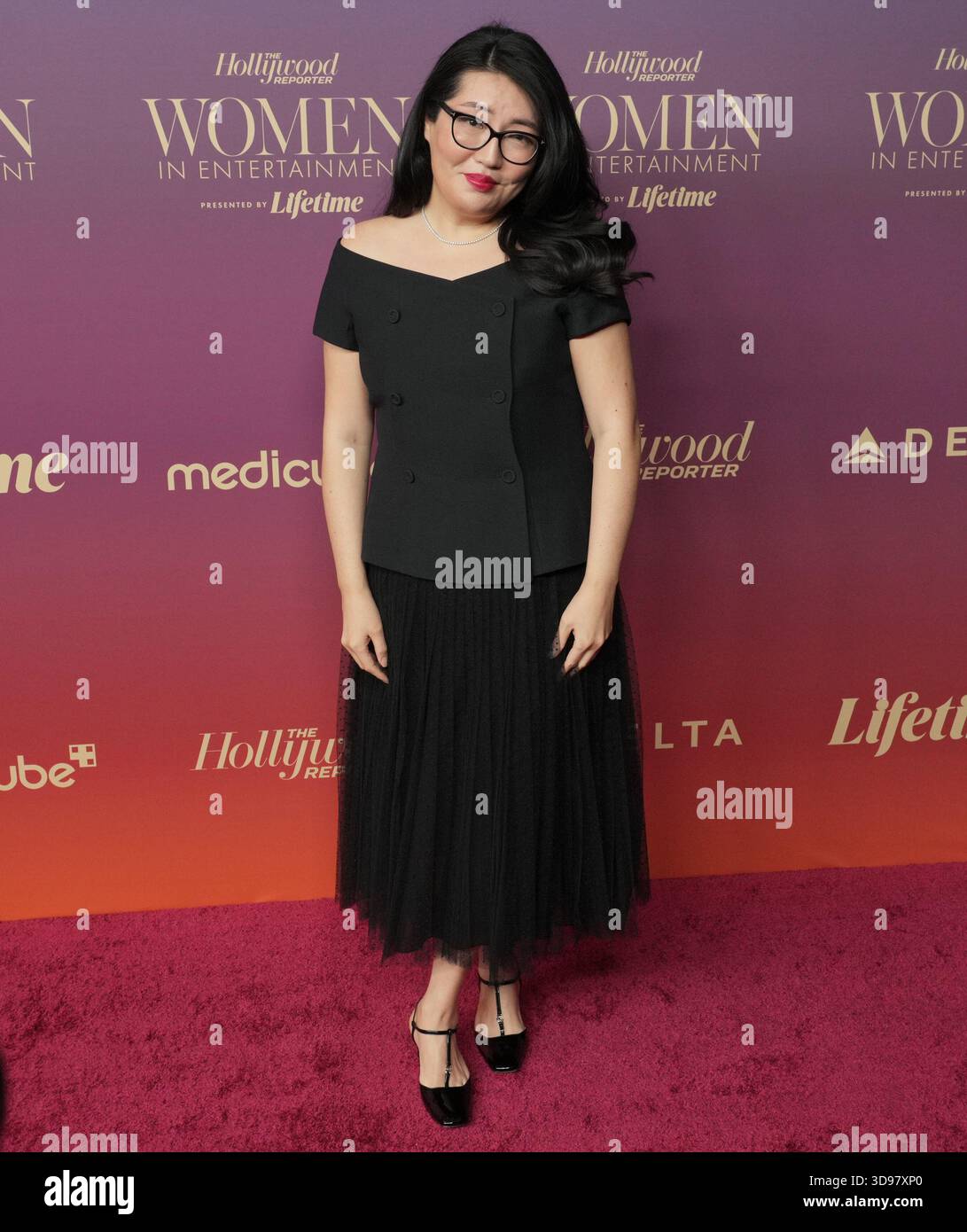 Jenny Han arrives at The Hollywood Reporter's Annual Women In ...