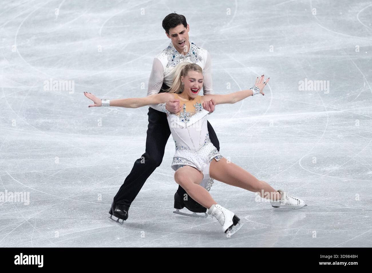 Piper Gilles and Paul Poirier, of Canada, compete in the ice dance's ...