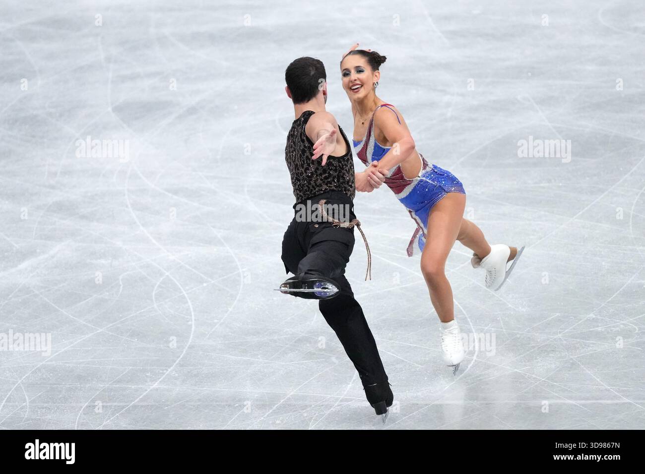 Lilah Fear and Lewis Gibson, of Great Britain, compete in the ice dance ...