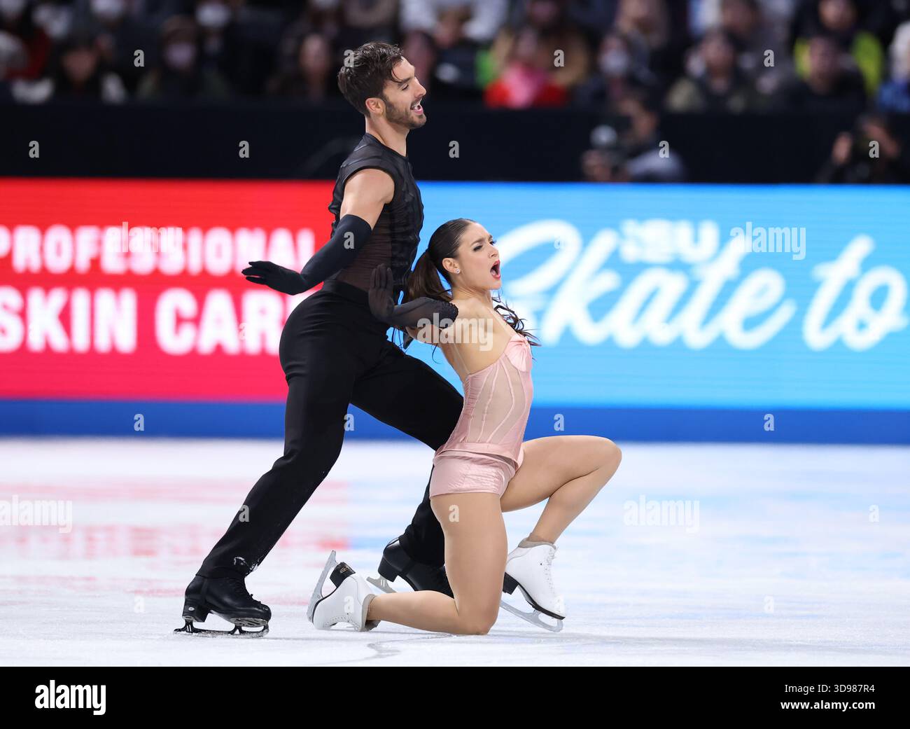 Laurence FOURNIER BEAUDRY and Guillaume CIZERON of France perform in ...